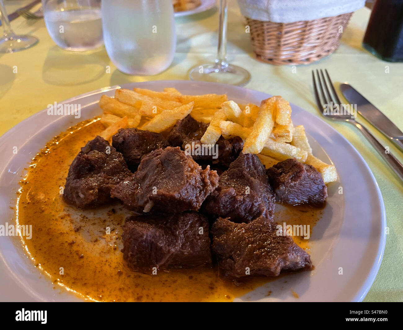 Meat stew with chips Stock Photo - Alamy