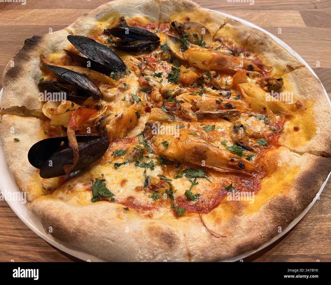 Italian style thin crust pizza Frutti di Mare or Fruits of the Sea ...