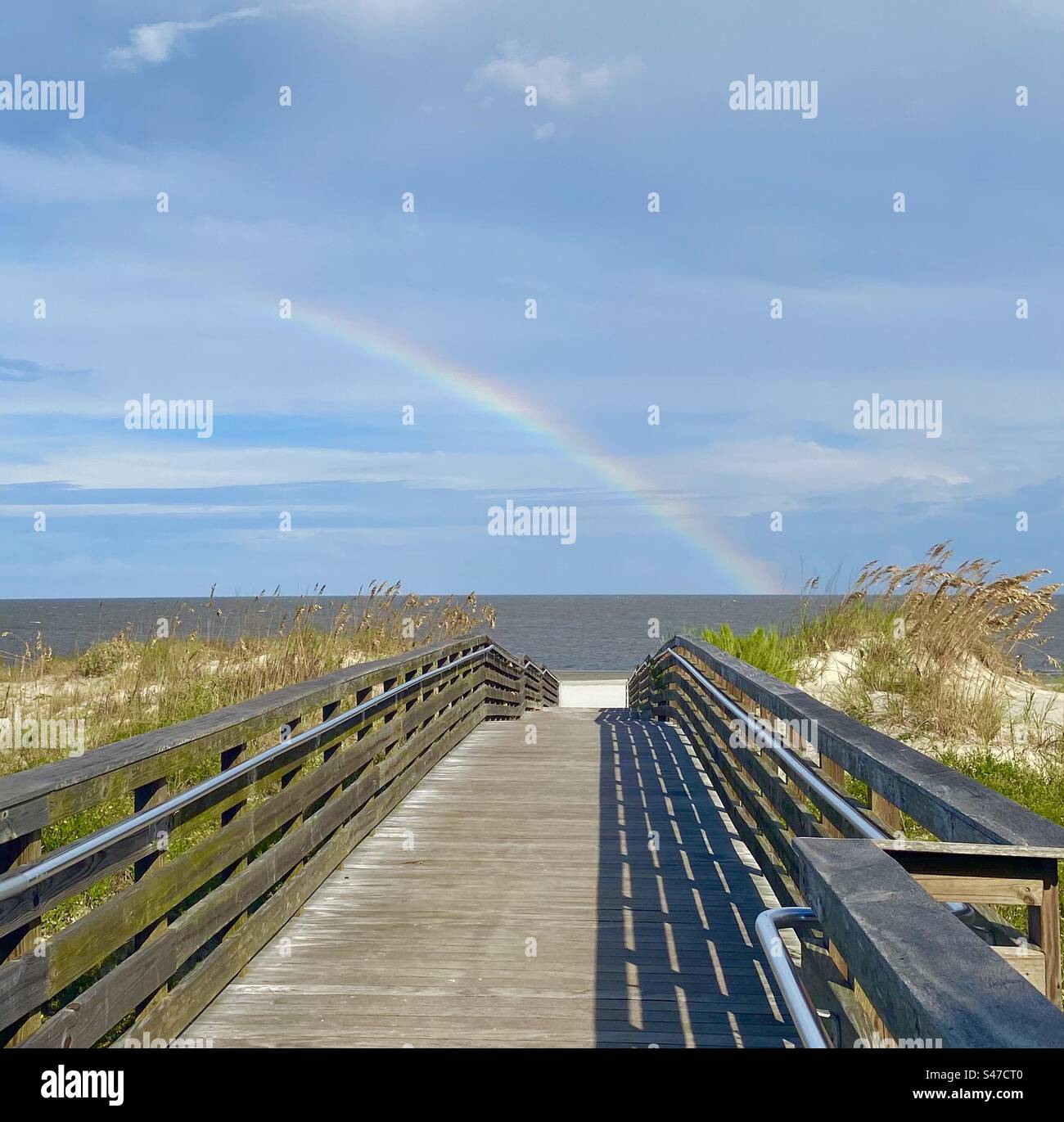 Rainbow over sand dunes on Golden Isles of Georgia beach Stock Photo ...