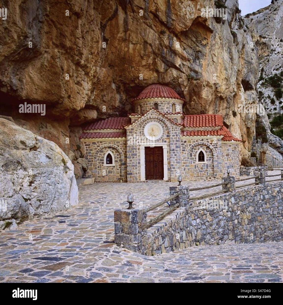Little church hiding in the mountain Stock Photo - Alamy