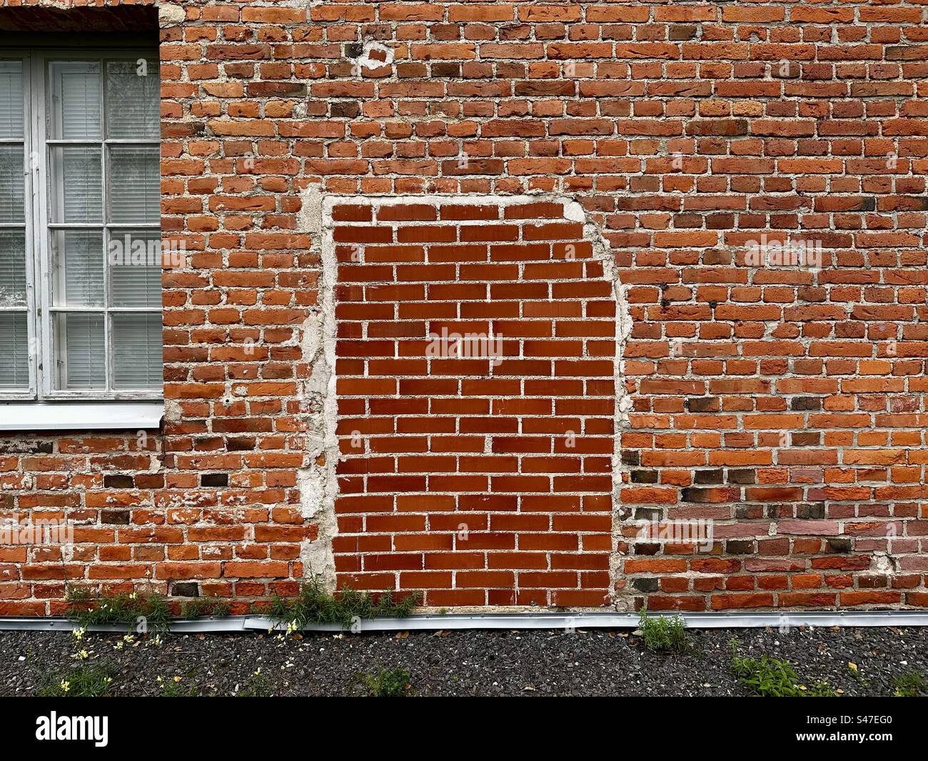 Bricked up door Stock Photo - Alamy