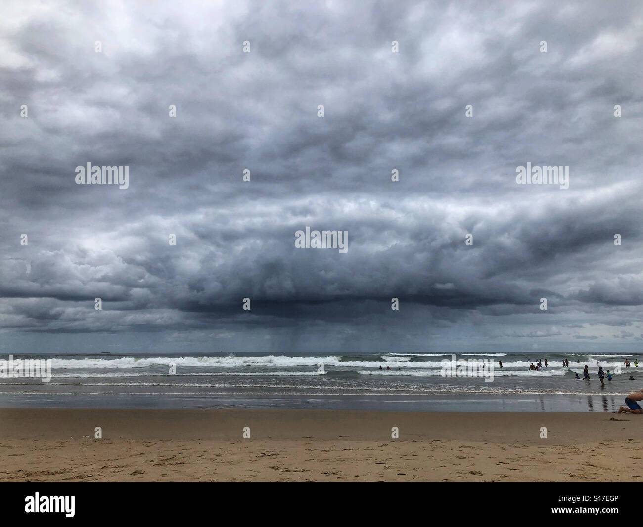 Dark and menacing storm cloud over Durban beach, South Africa Stock ...