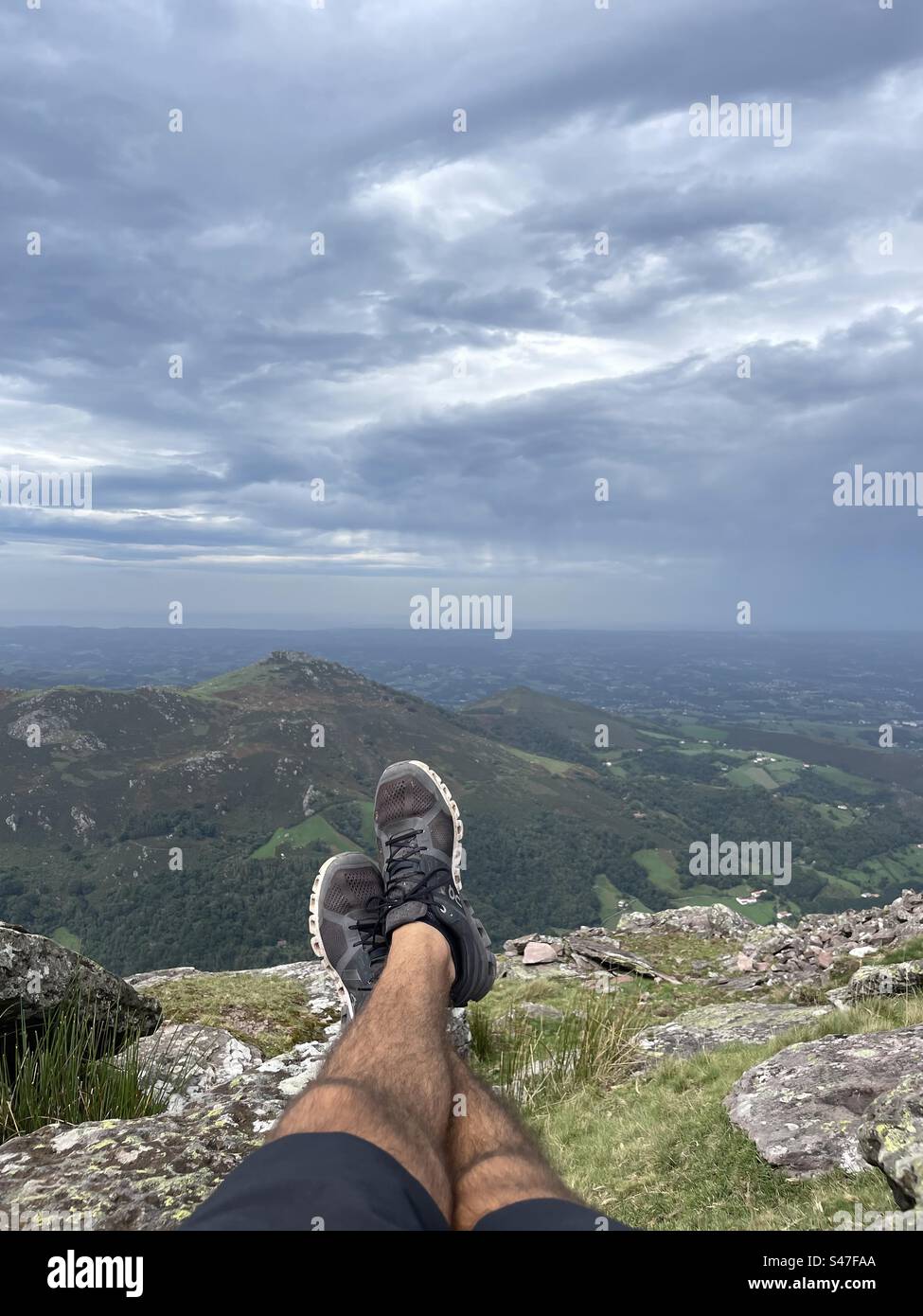 Legs on mountain hi-res stock photography and images - Alamy
