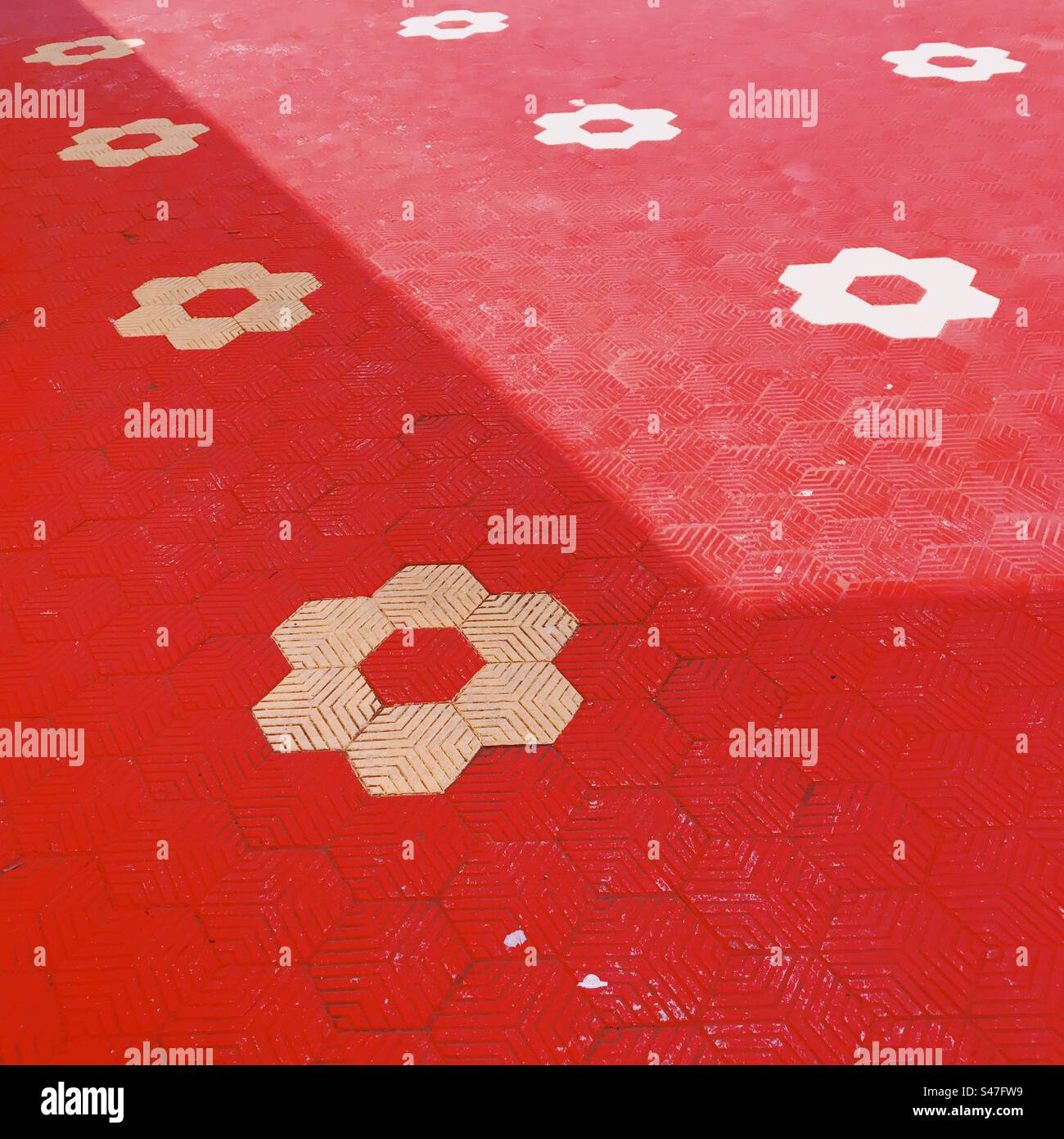 Floral design on the tiles of a church compound Stock Photo - Alamy