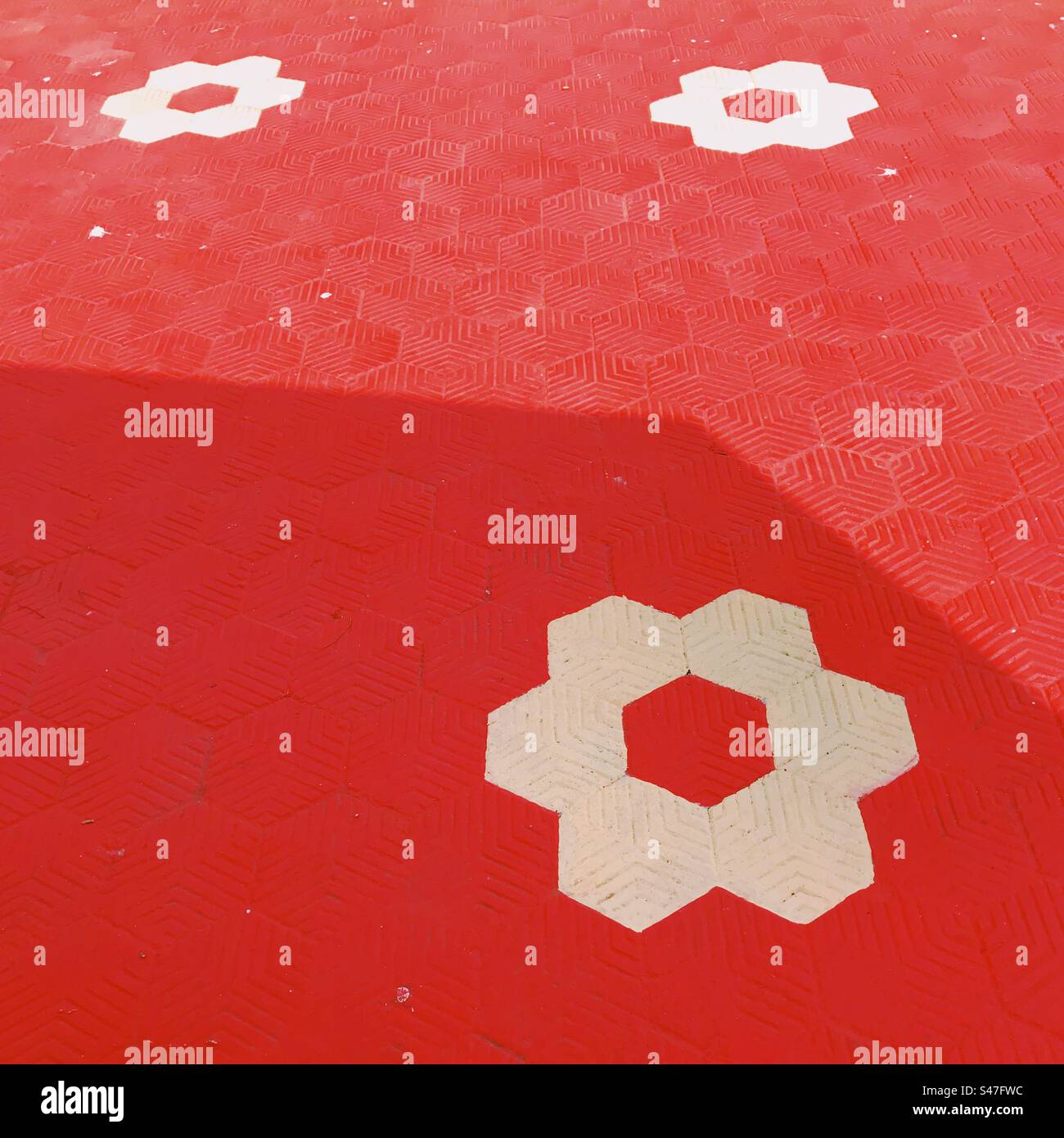Floral design on the tiles of a church compound Stock Photo - Alamy