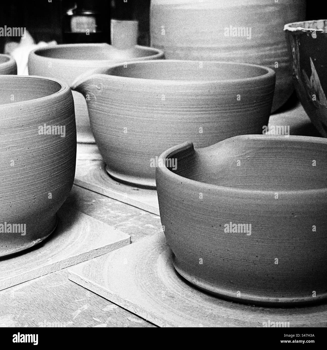 Pottery pouring bowls Stock Photo - Alamy