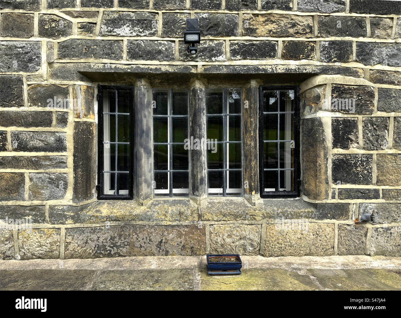 View of a 17th century, stone mullion window, in an old farmhouse near ...