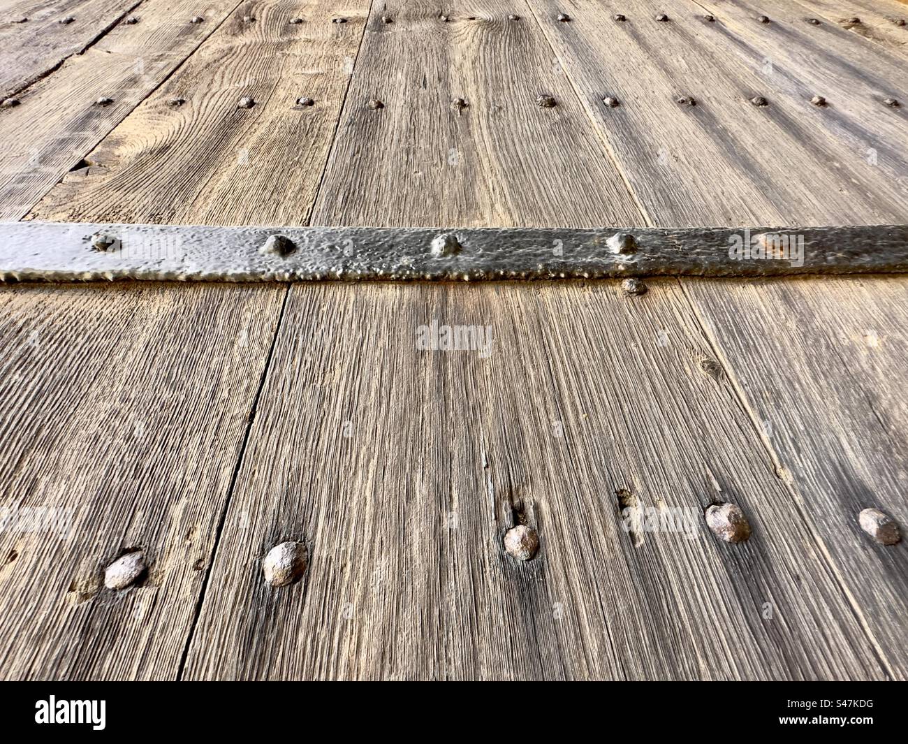 A close-up of the huge barn doors of the Bradford on Avon tithe barn ...