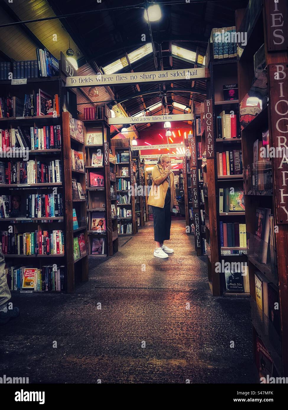 A girl inside Barter books, Alnwick, Northumberland Stock Photo - Alamy