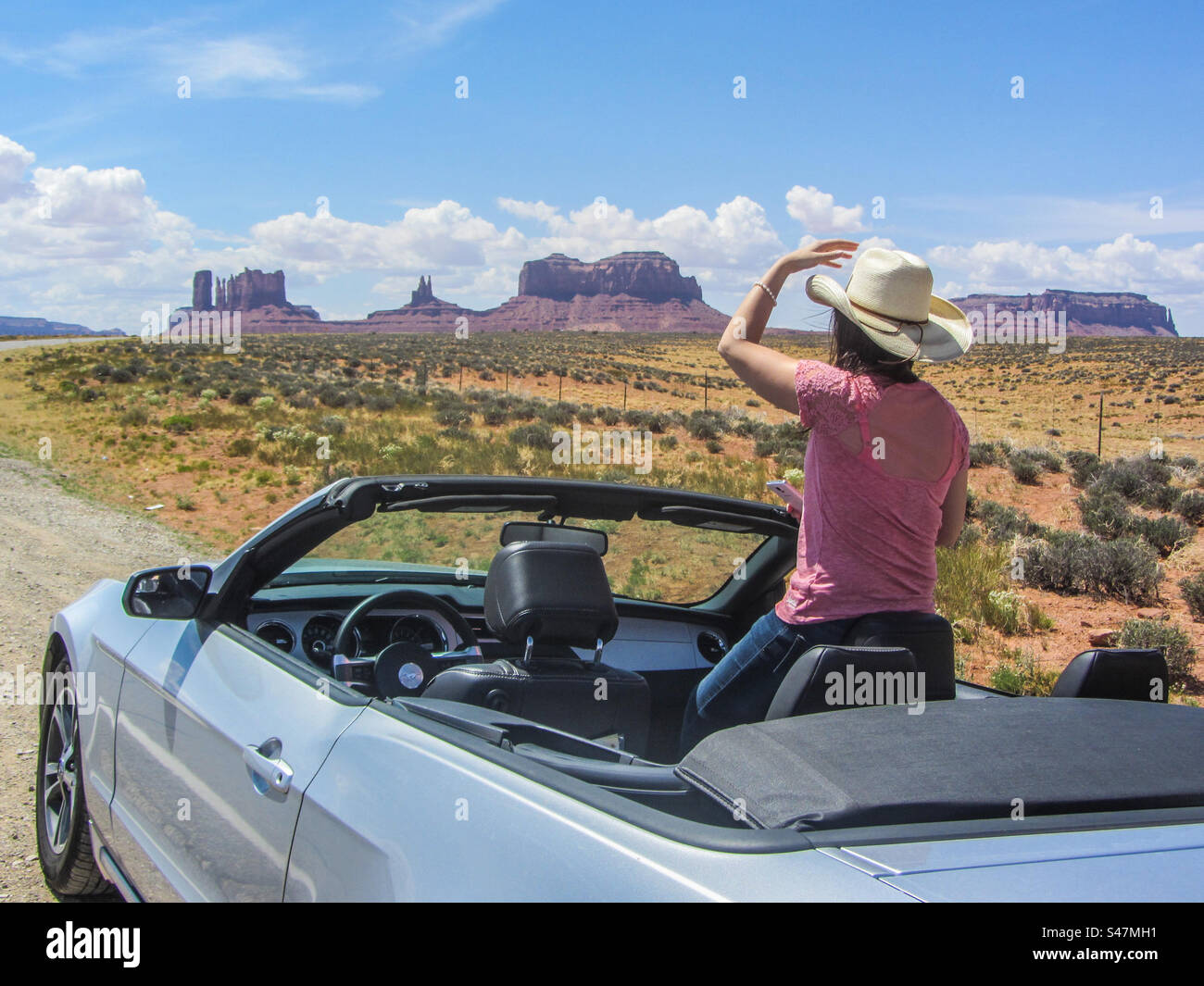 Driving through Monument Valley Stock Photo - Alamy