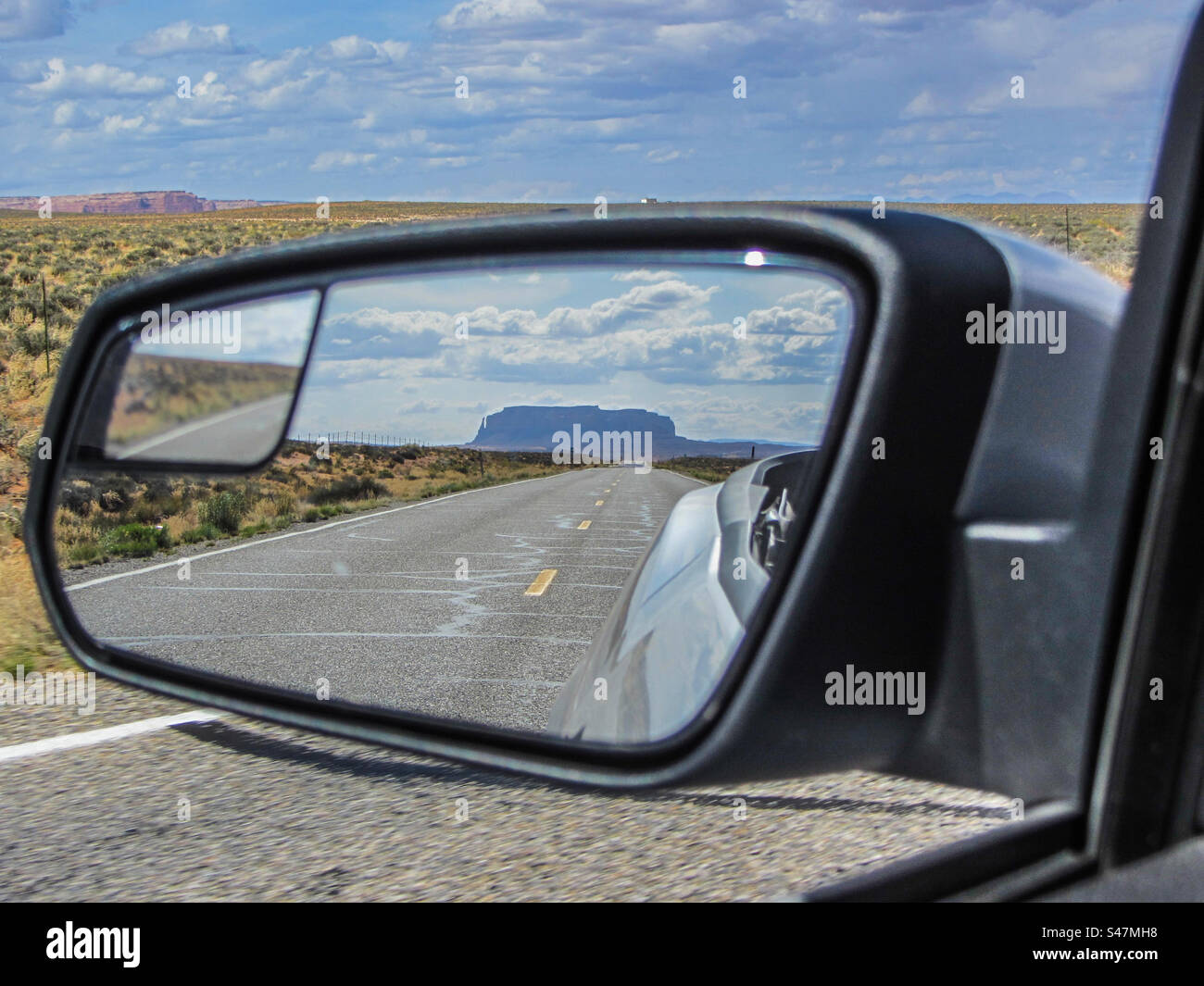 Driving through Monument Valley Stock Photo - Alamy