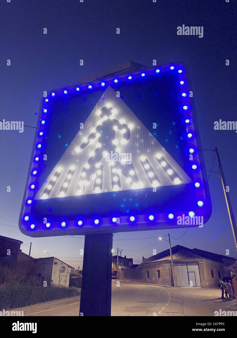 Lit up solar powered zebra crossing sign Stock Photo - Alamy