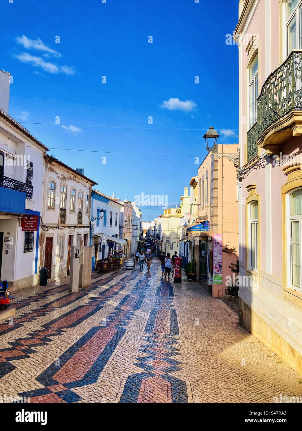 Old town street view in Lagos Portugal on the Algarve Stock Photo - Alamy