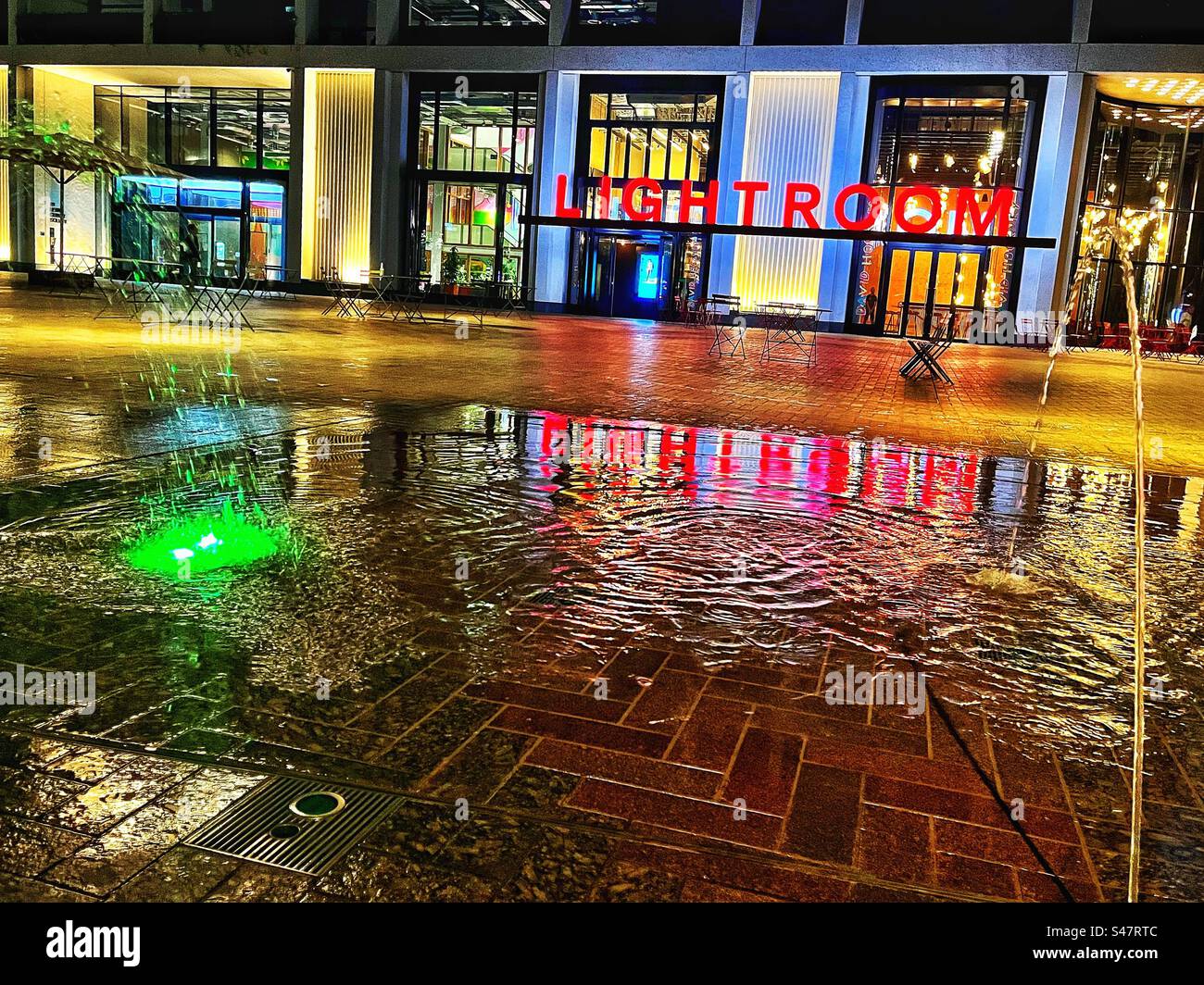 Water splashing in the public fountain in Kings Cross’ Coal Drop Yard ...