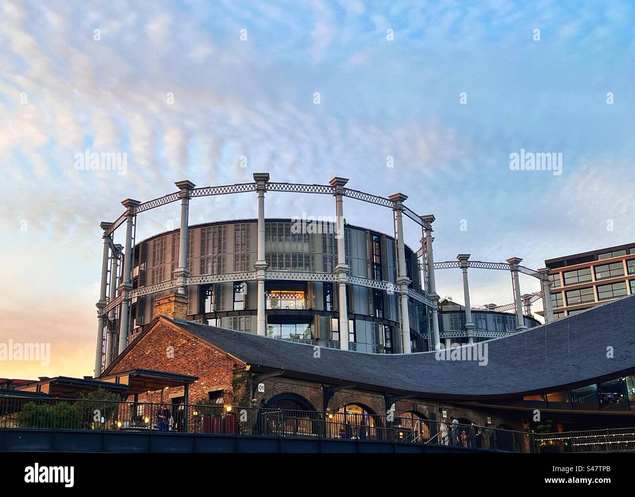 Coal Drop Yard with its curved rooftops with the Gas Holders in the ...