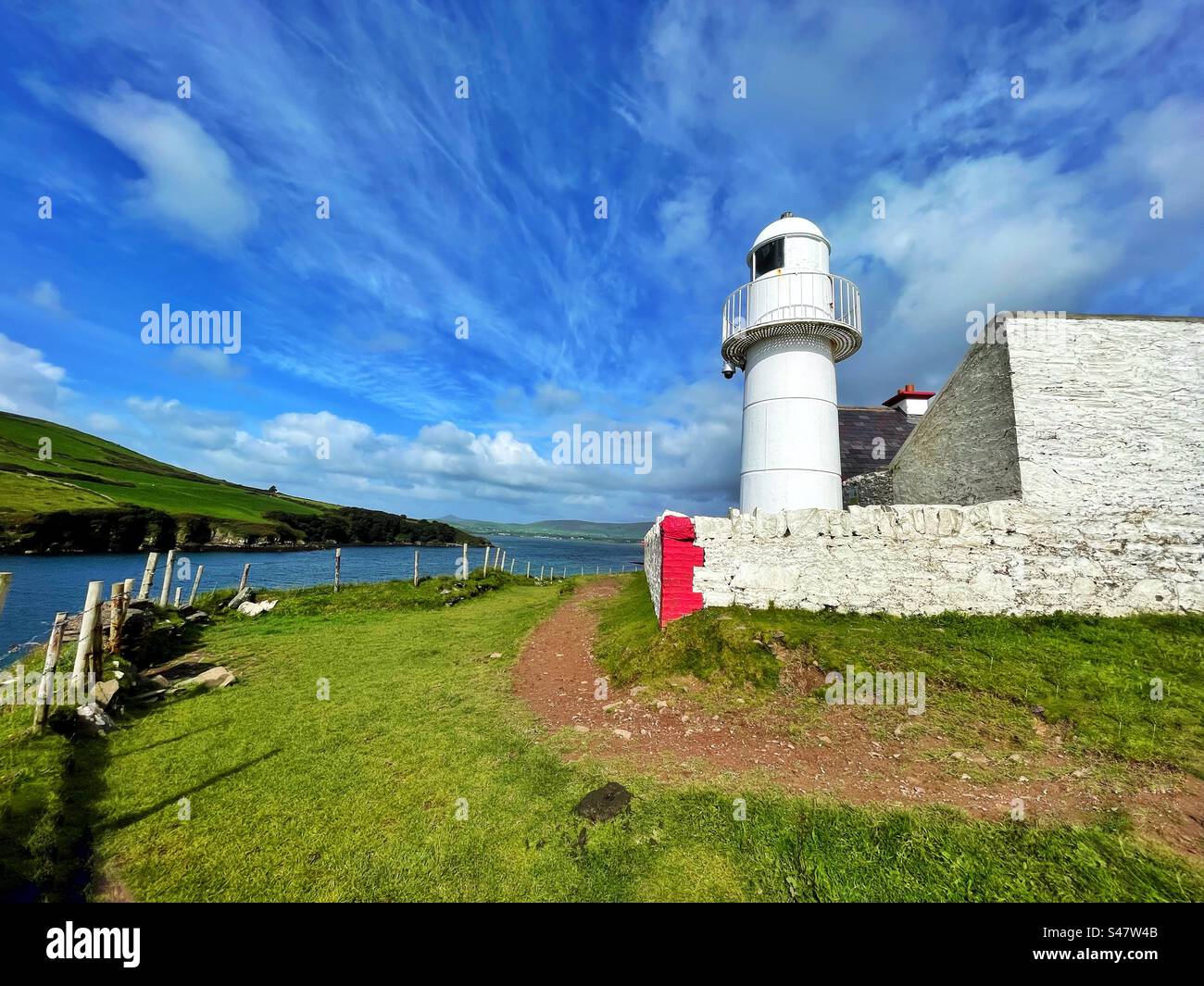 Dingle lighthouse at the entrance to Dingle harbour, County Kerry ...