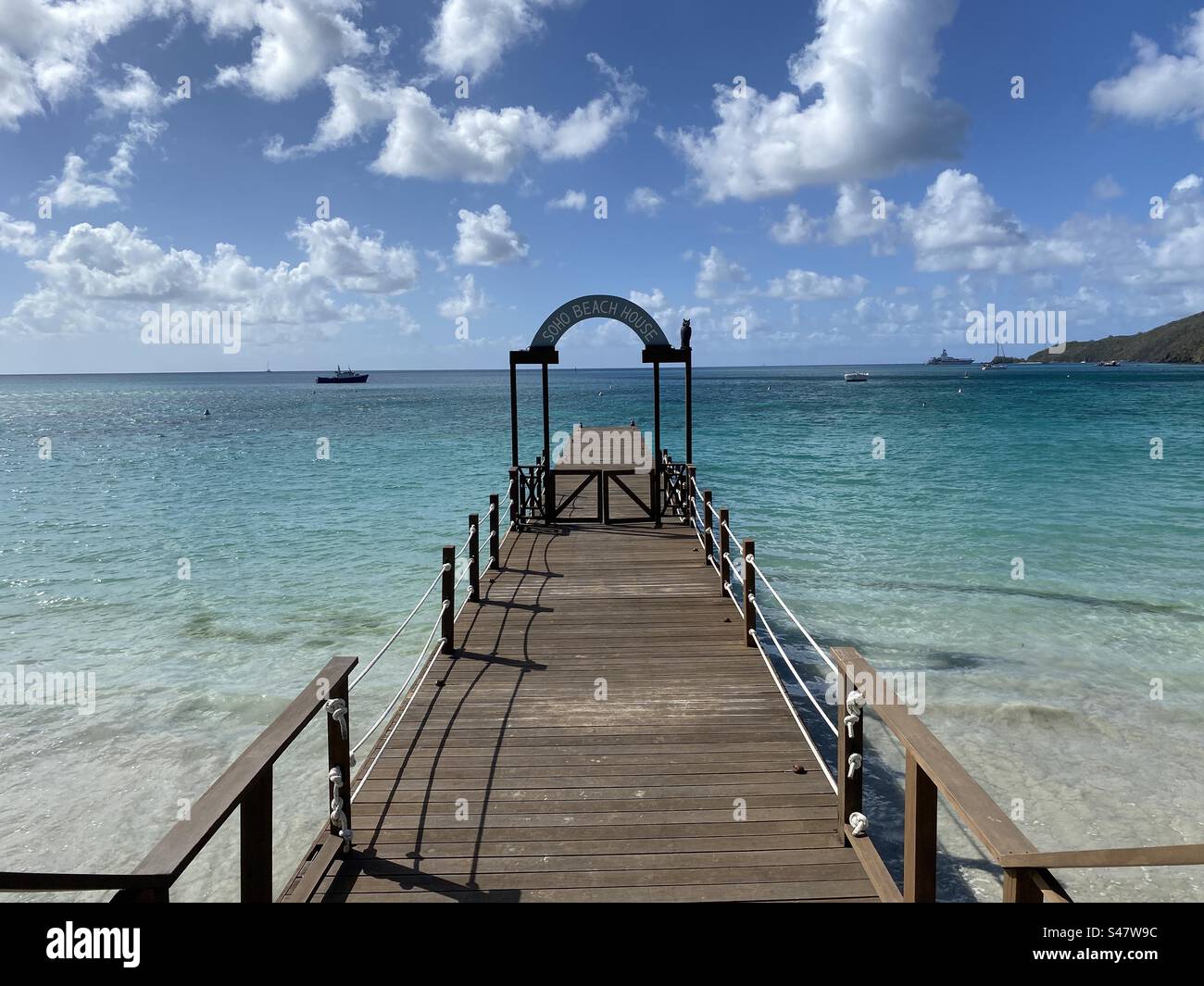 Peer looking out at the ocean, Canouan Island, Saint Vincent and the ...
