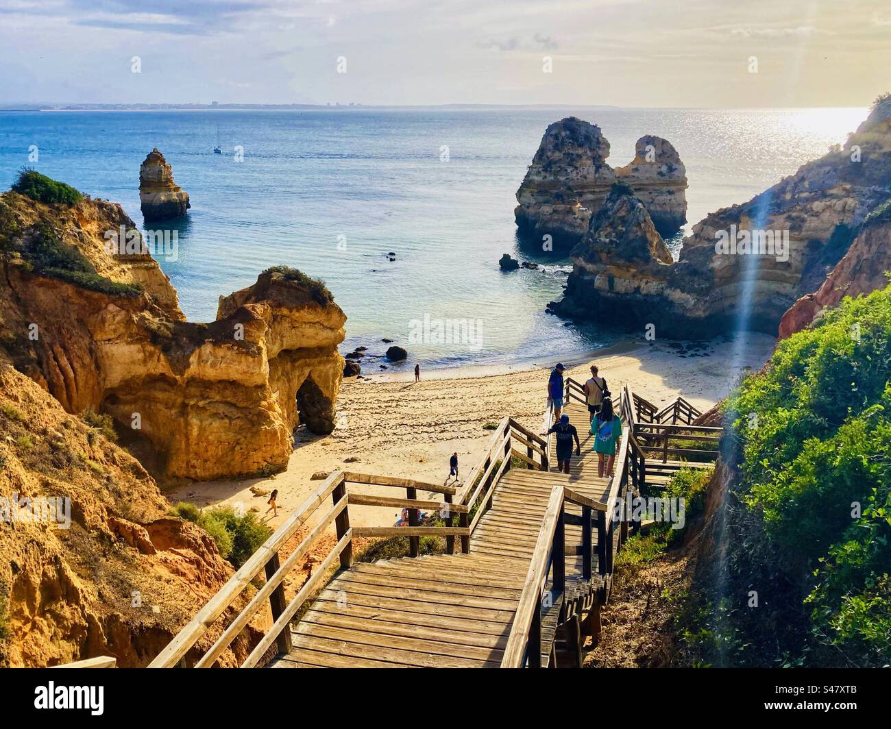 Praia do Camilo beach in Lagos Portugal looking down the wooden ...