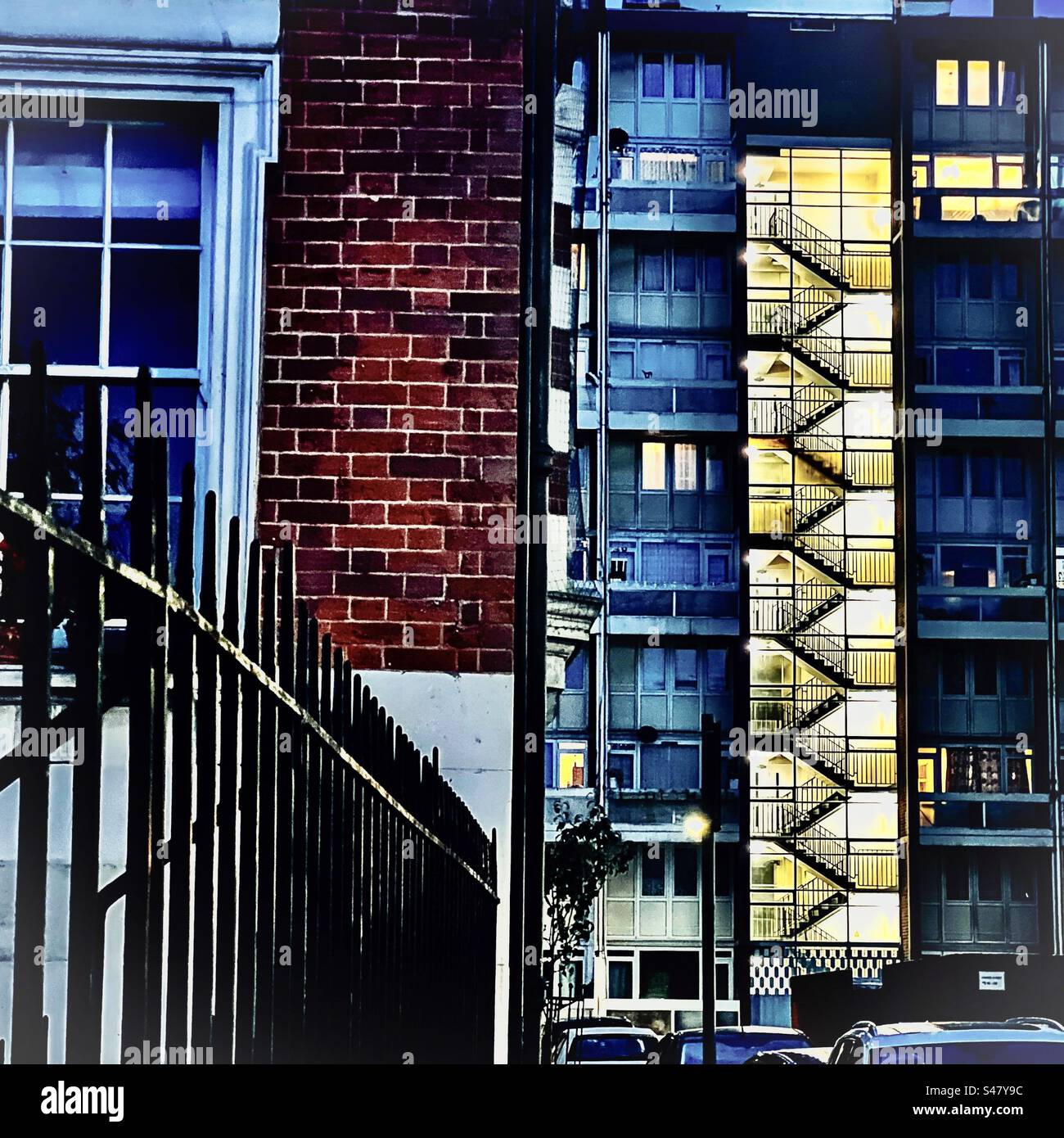 London Tower Block juxtaposed with Victorian Brick house Whitechapel ...