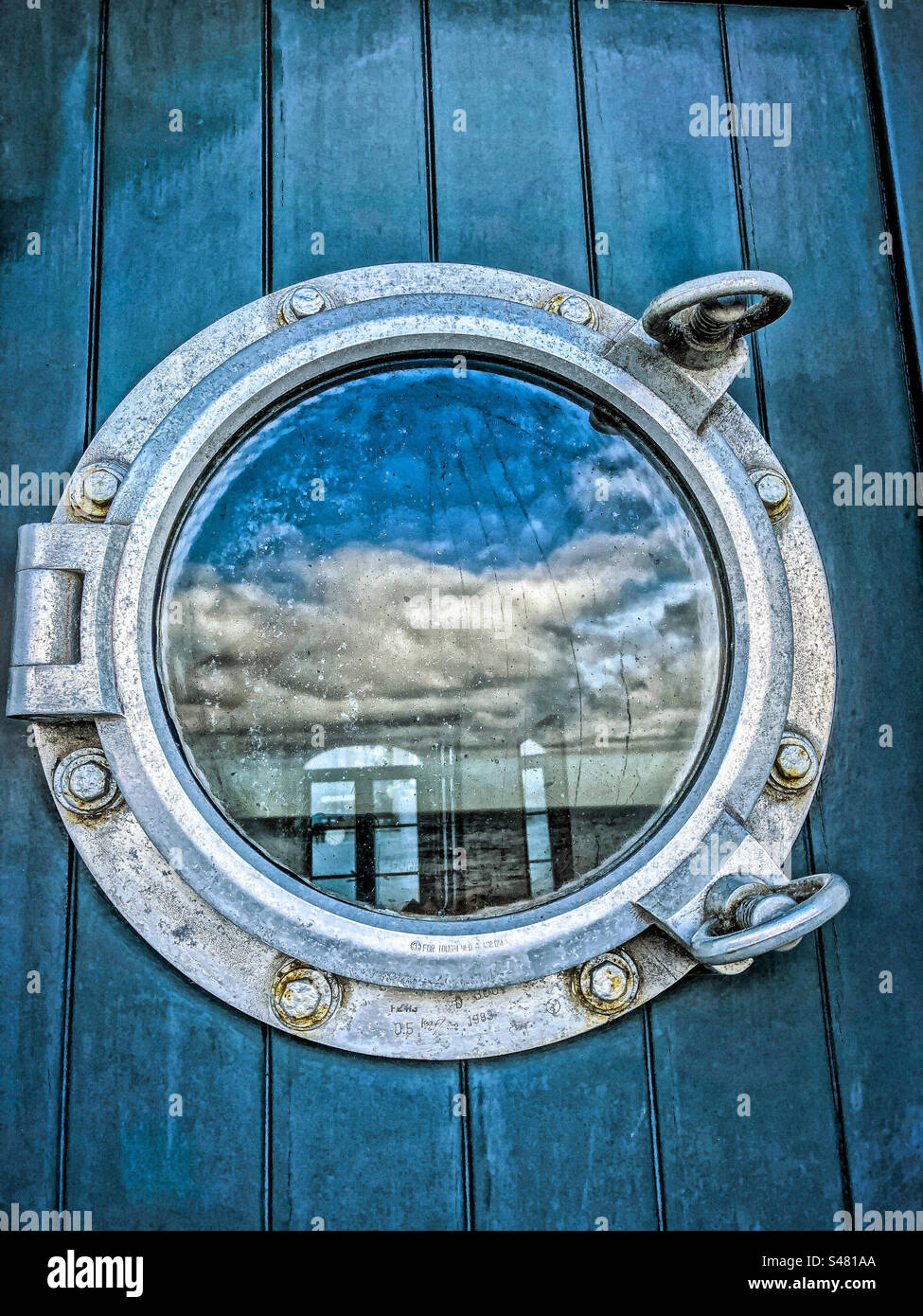 A porthole style window on the front door of a seafront house in Deal ...