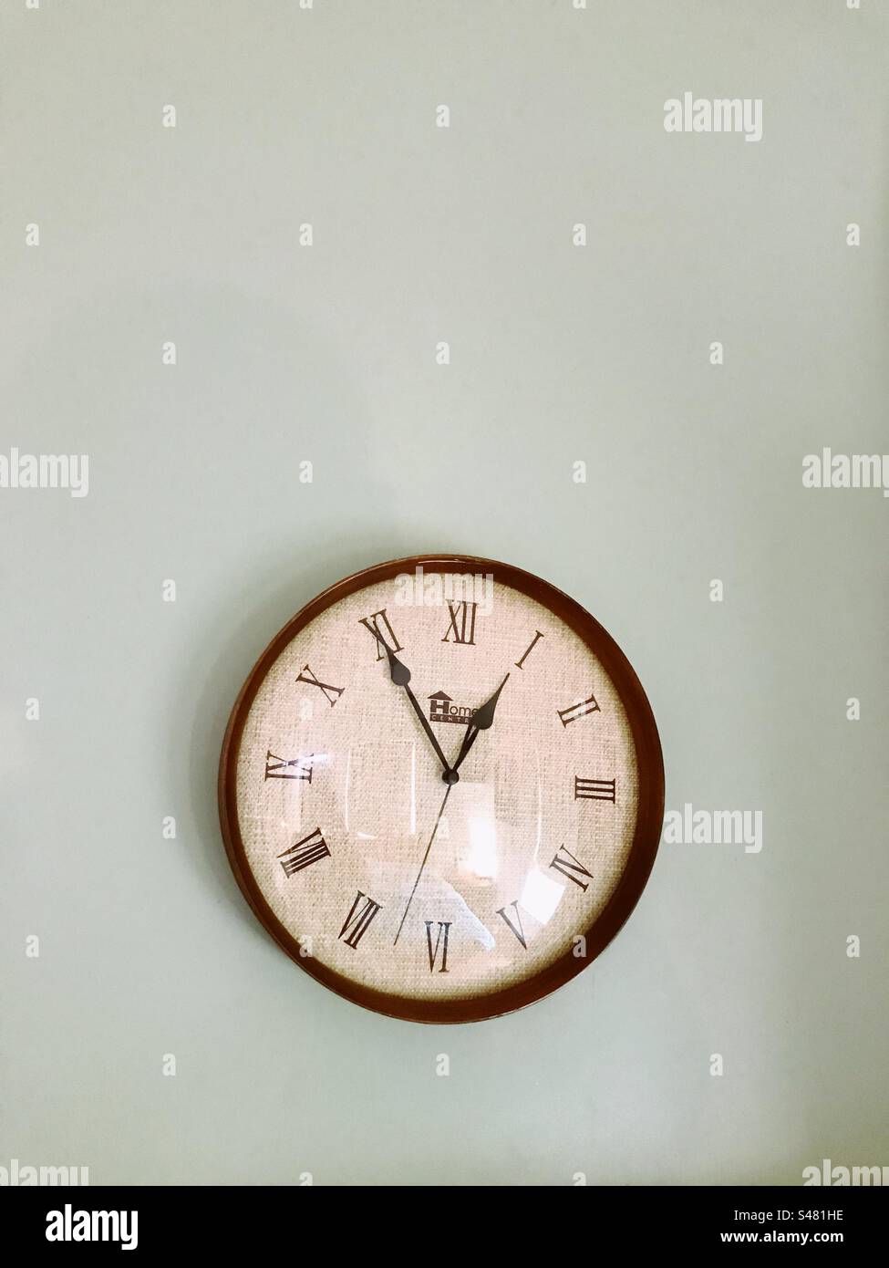 Hanging wall clock hi-res stock photography and images - Alamy