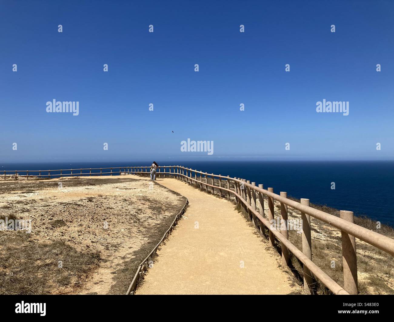 View of Cape Espichel fort,sky and blue Atlantic Ocean, south Portugal ...