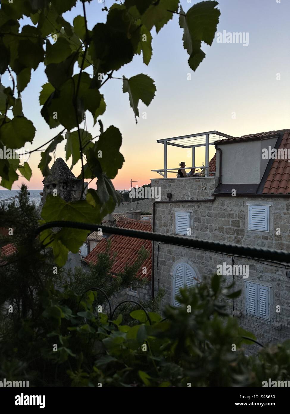 Person with a roof hi-res stock photography and images - Alamy