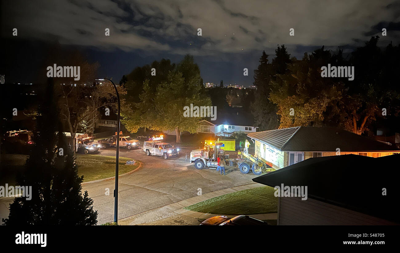 In the middle of the night, a house is readied for transport from its ...