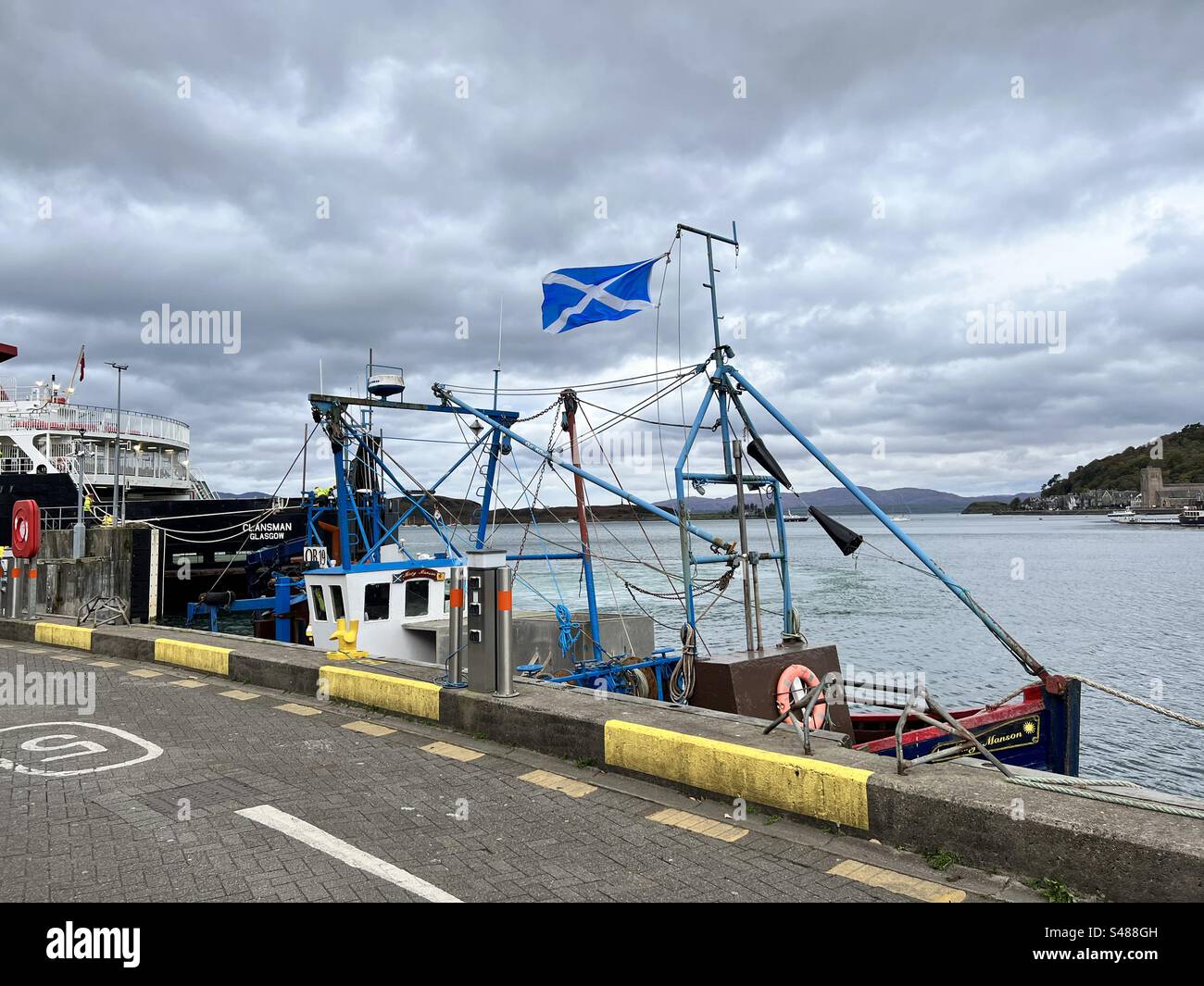 A top of a ferry with a Scottish flag, moored by Oban harbour Stock ...