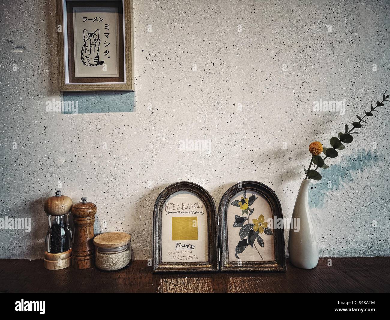 Vintage style display of bric-a-brac, salt and pepper grinders and ...