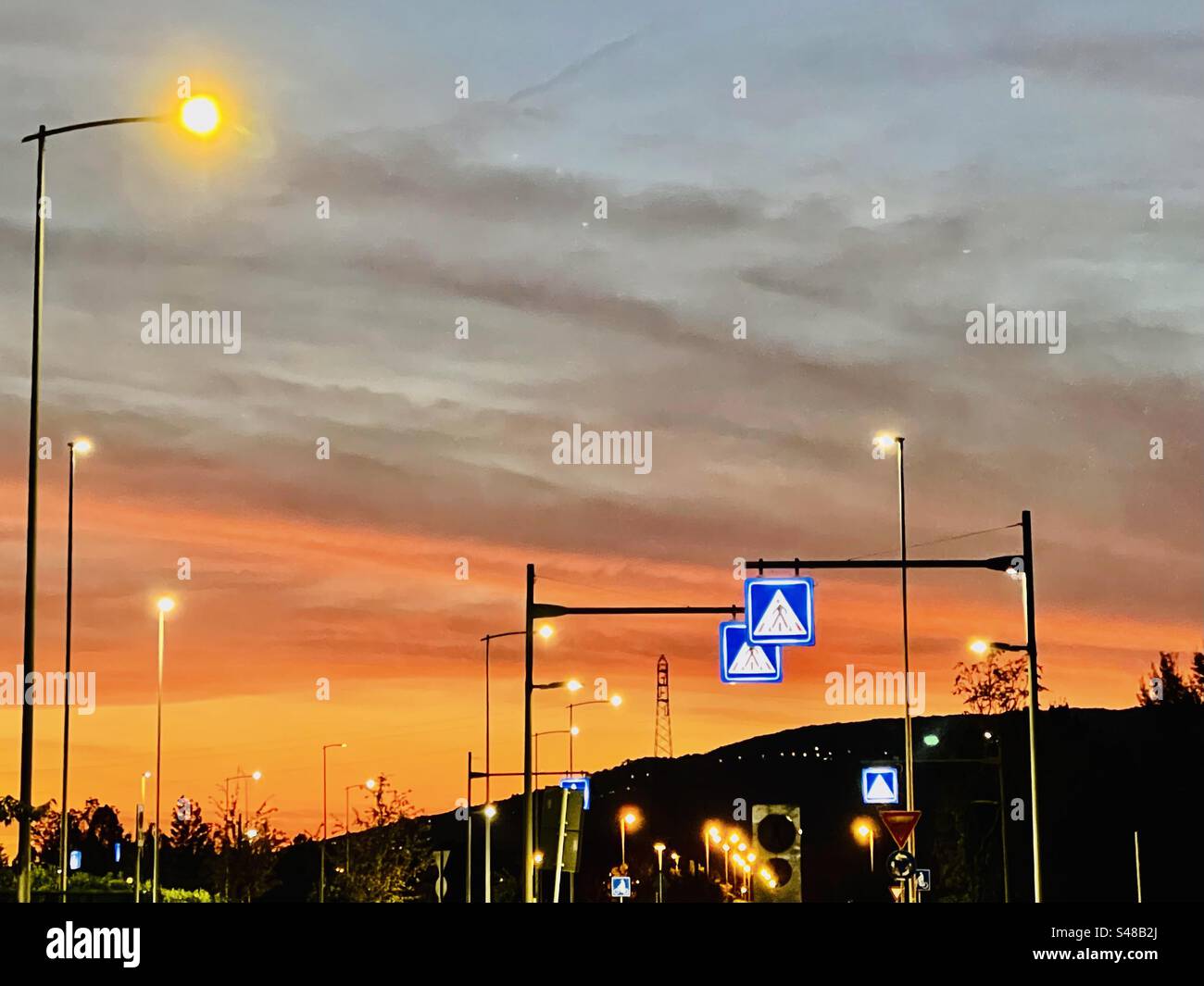 Downtown city lights at sunset hi-res stock photography and images - Alamy