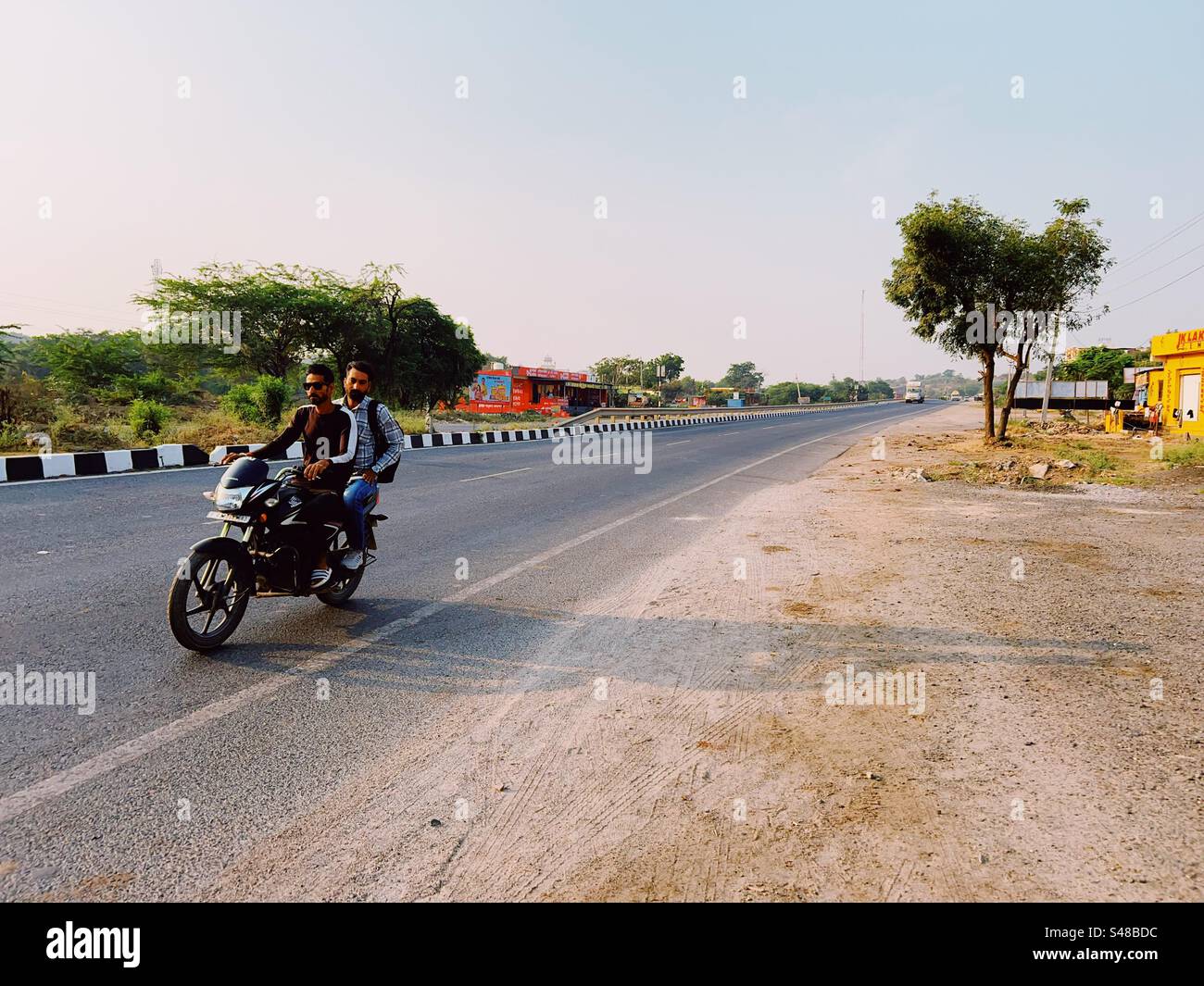 Two men ride on motorcycle hi-res stock photography and images - Alamy