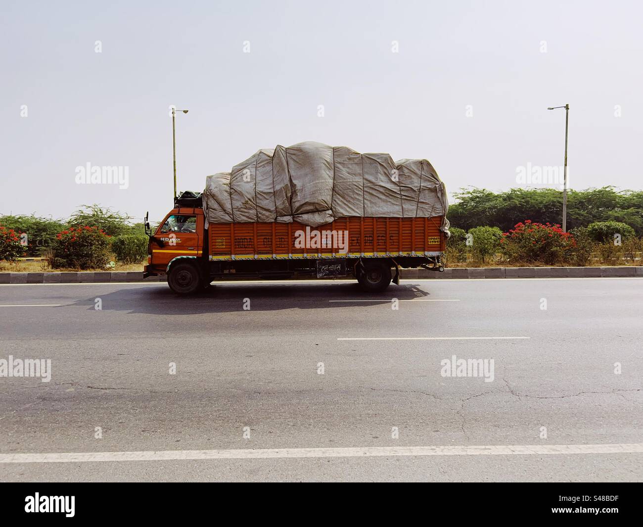 A cargo truck on an Indian National Highway Stock Photo - Alamy