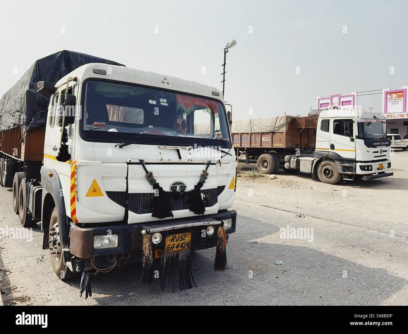 Cargo trucks parked on an Indian National Highway Stock Photo - Alamy
