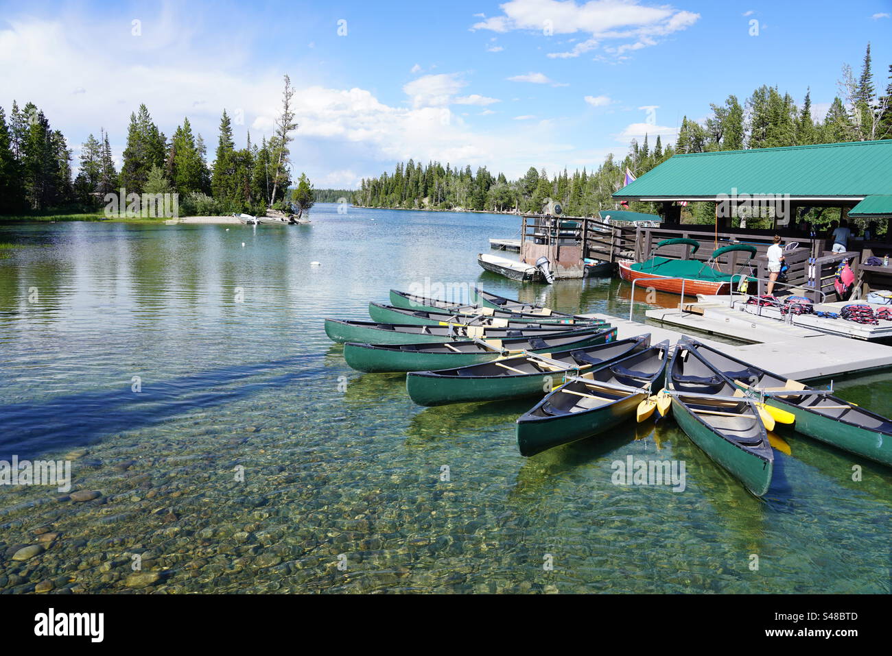 Kayak boat dock at Jenny lake in grand Teton national park in Jackson ...
