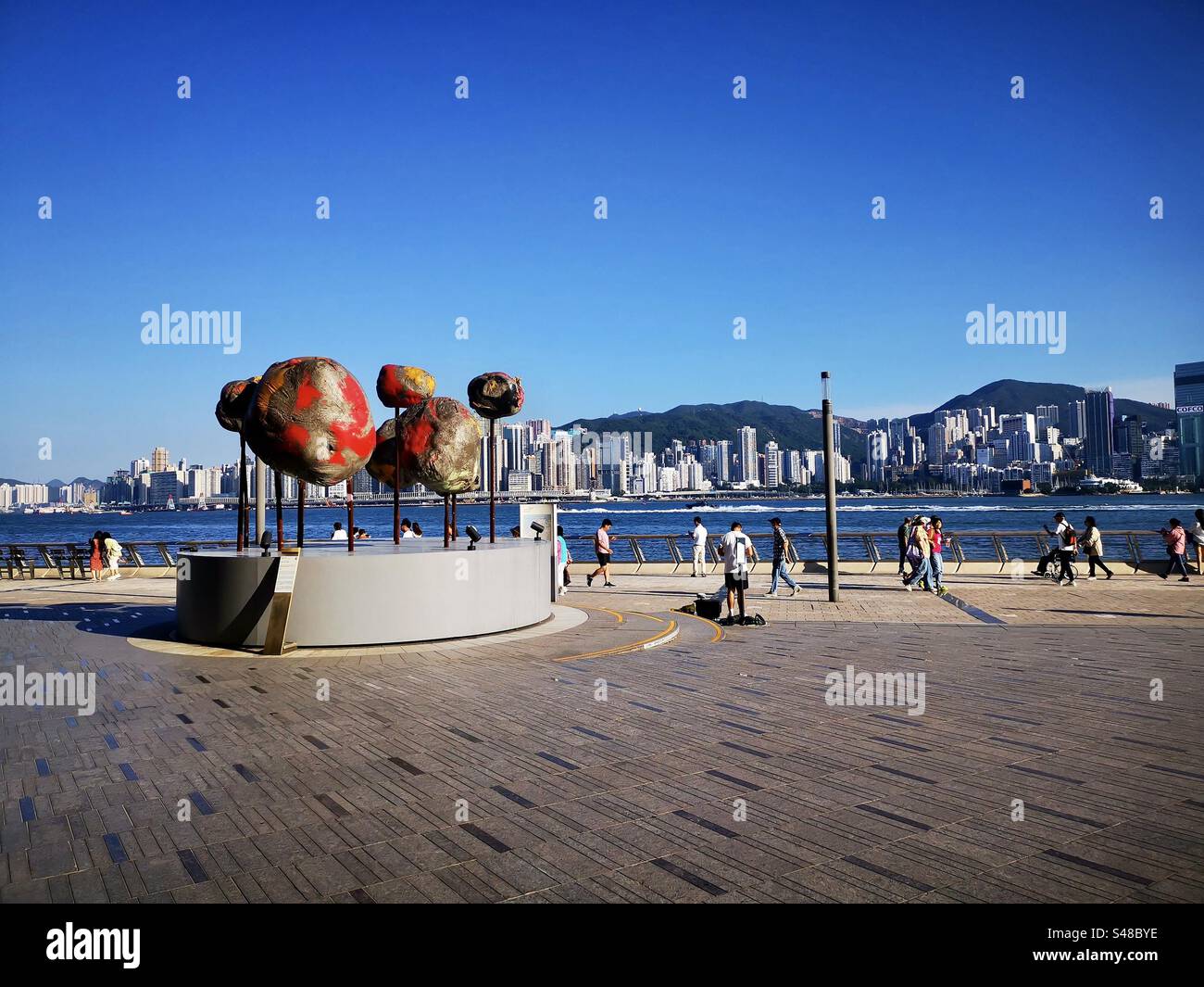 The TST waterfront promenade in Hong Kong Stock Photo - Alamy