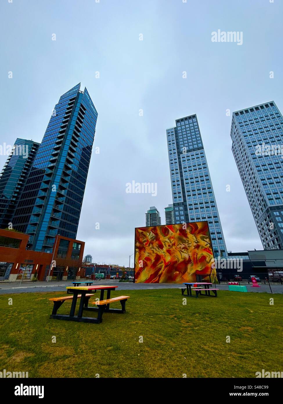 Park and mural, downtown Calgary, Alberta, picnic table, offices, high ...