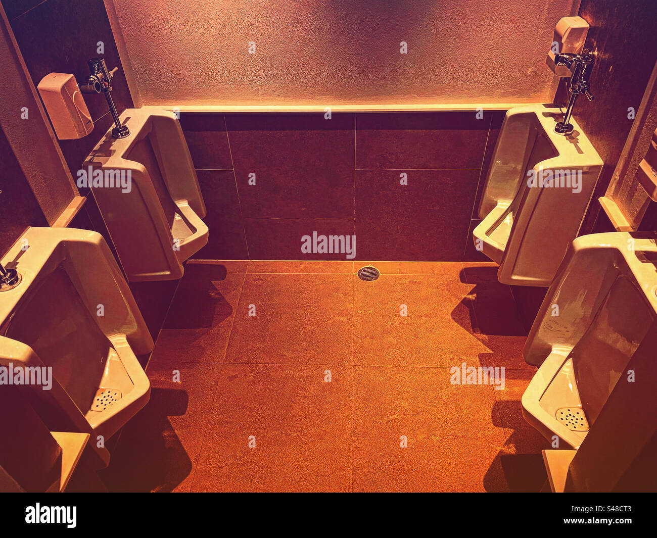 Men’s room toilets to pee in a public space such as mall, restaurant or ...