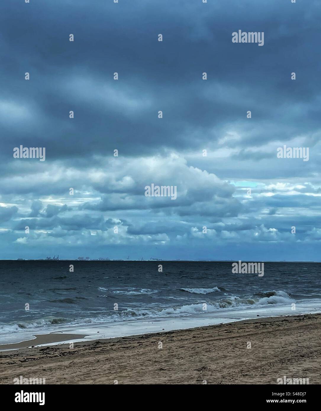 Cloudy day at the beach hi-res stock photography and images - Alamy