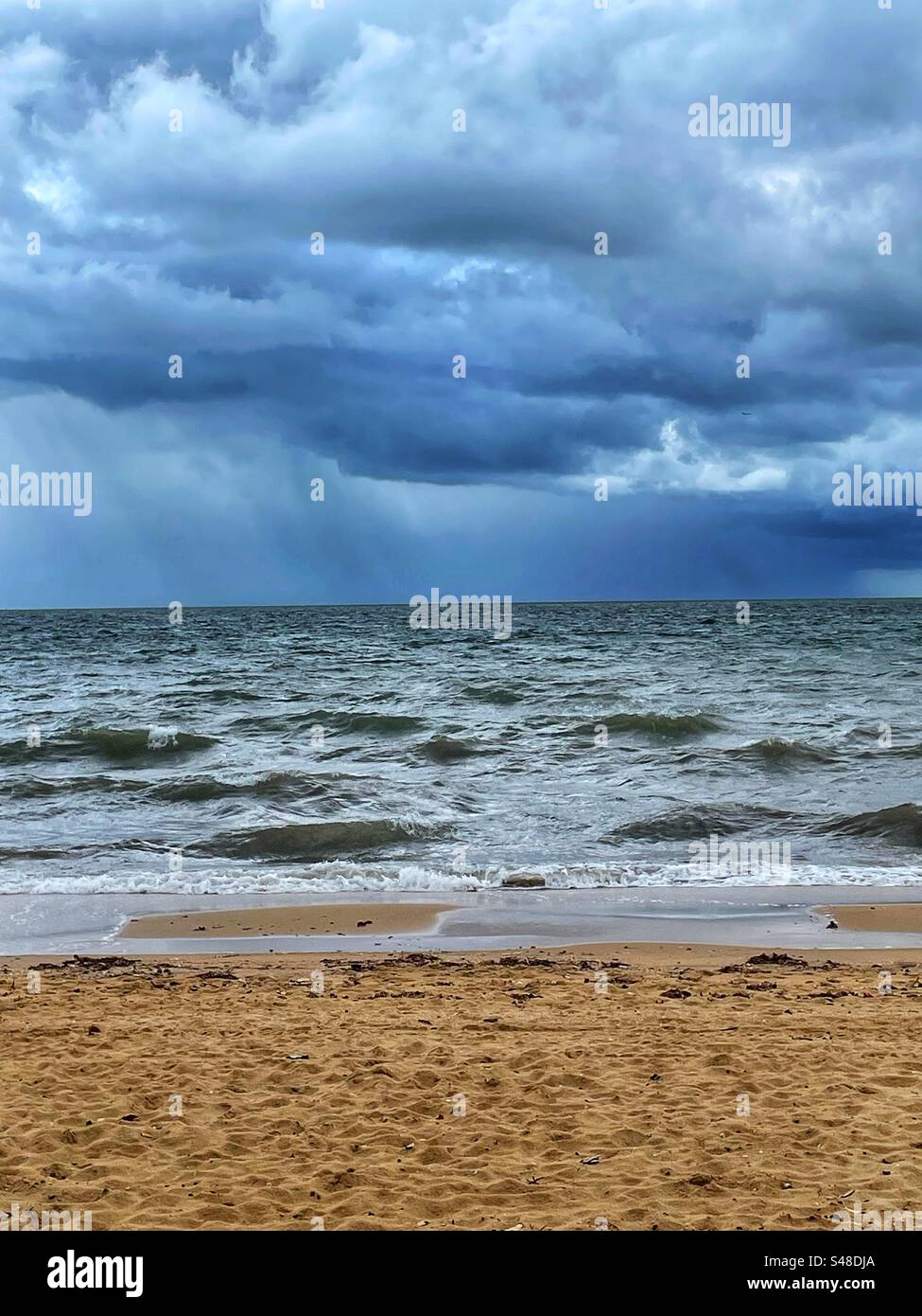 Heavy rain on beach hi-res stock photography and images - Alamy