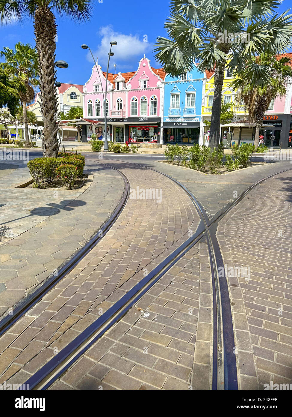 Tramway and shops in central Oranjestad, Aruba Stock Photo - Alamy