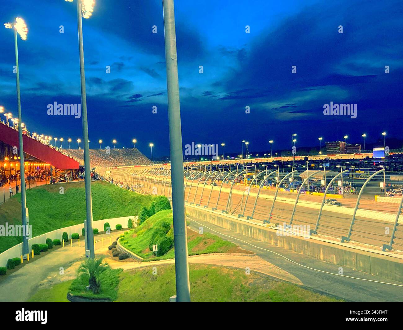 A bright race track with dark clouds in the background in Darlington ...
