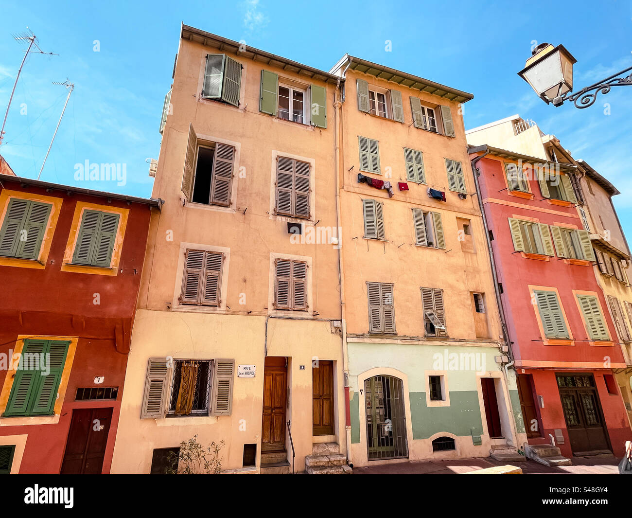 Residential buildings in Nice, France with blue sky above Stock Photo ...