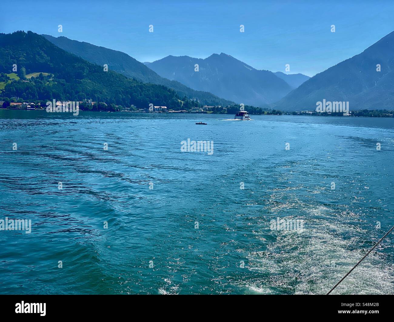 Boat view at lake Tegernsee surrounded by Bavarian Alps, Germany Stock ...
