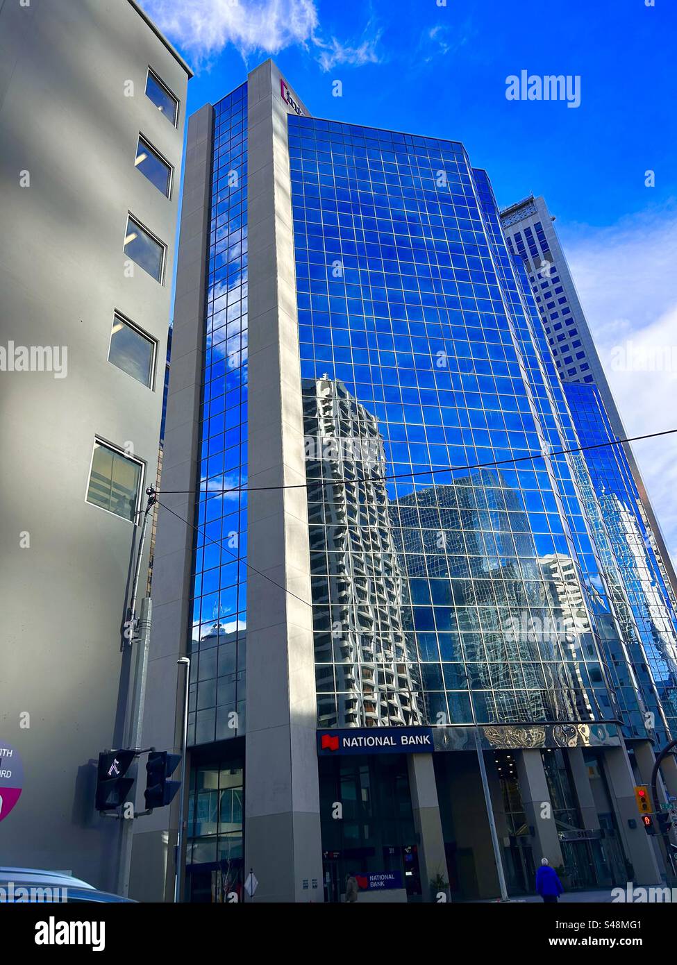Street scene, 6th Avenue south, downtown Calgary, Alberta. Sky scrapers ...