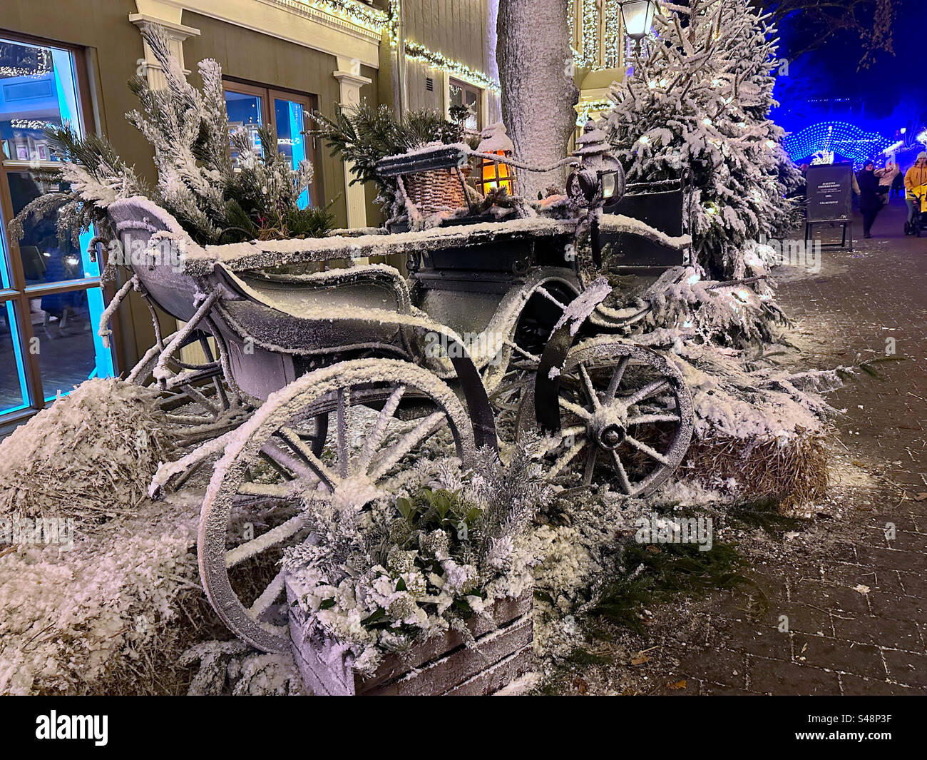 An old fashioned carriage covered in fake snow at Liseberg theme park ...