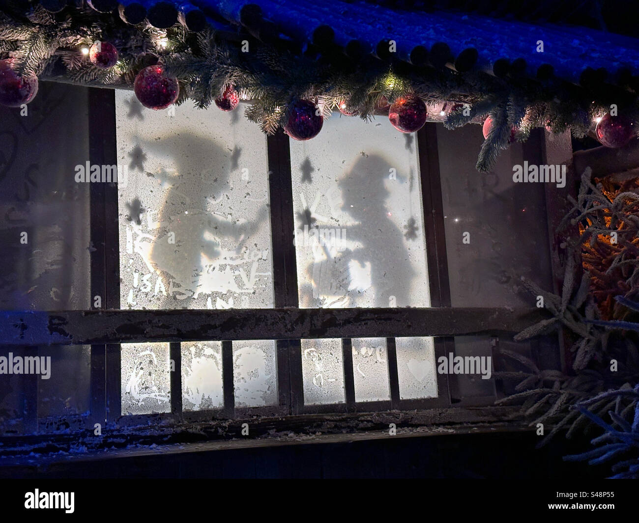 Santa’s elves working behind a window at Liseberg theme park at ...