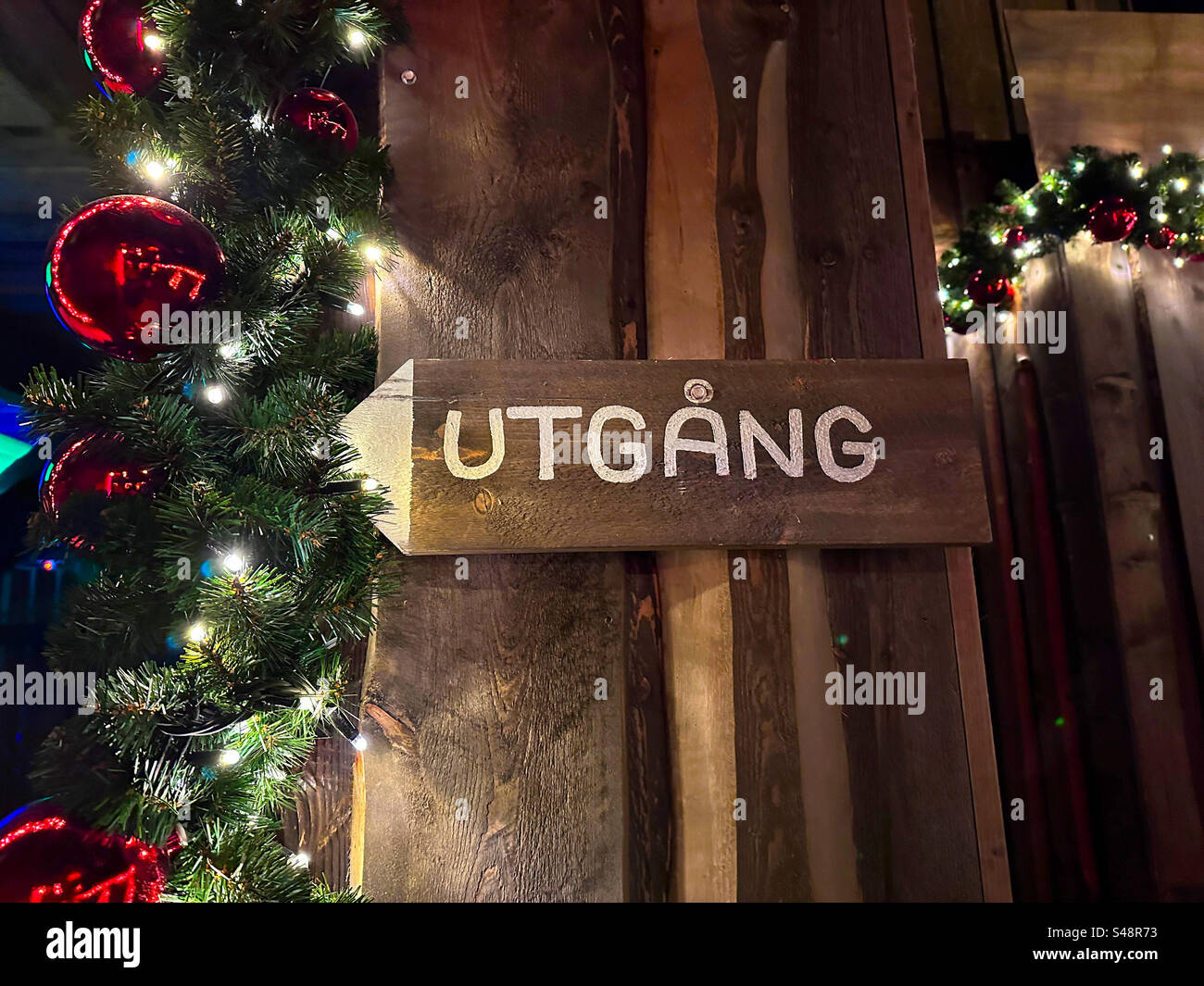 A sign marks the exit in Swedish from Santa’s grotto at Liseberg theme ...