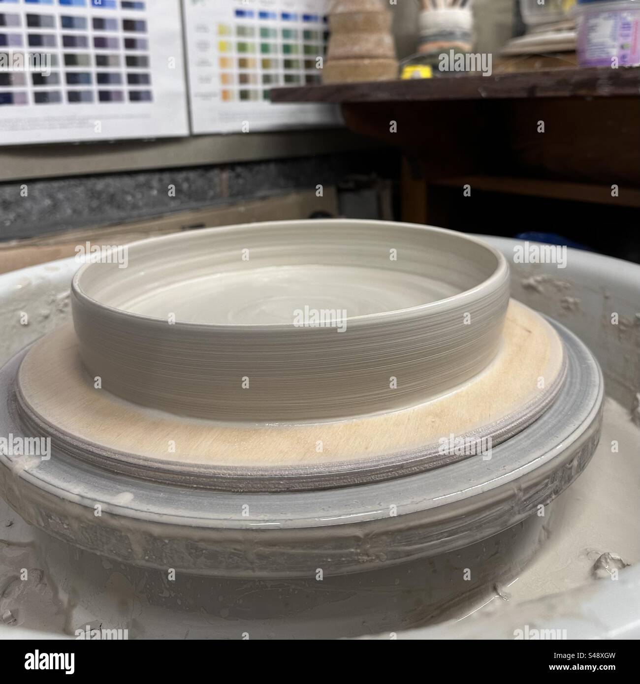 Throwing on potters wheel Stock Photo - Alamy