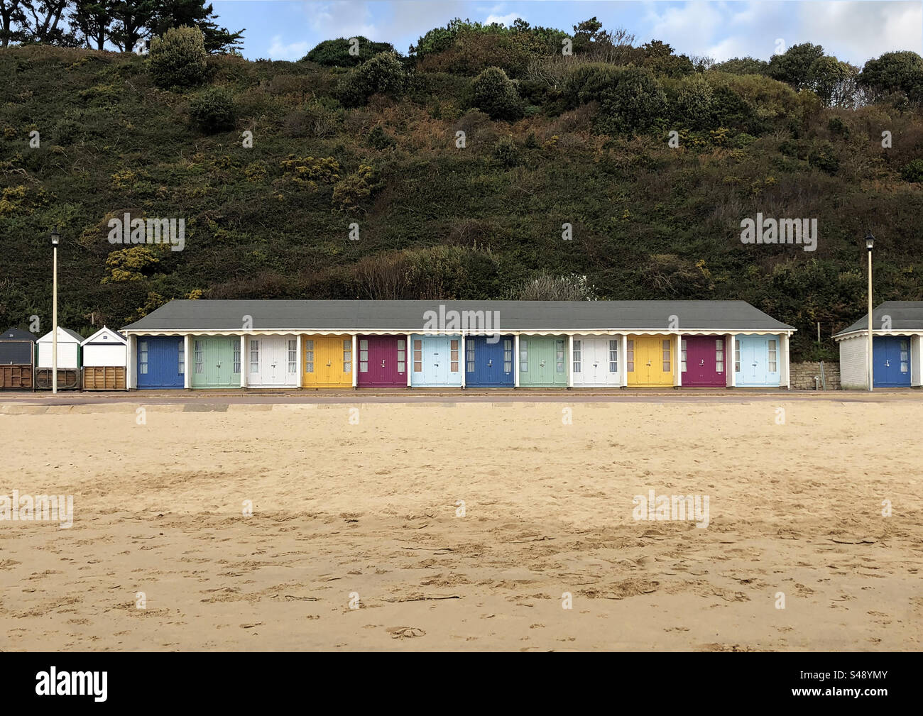 Colourful English Beach Huts Stock Photo - Alamy